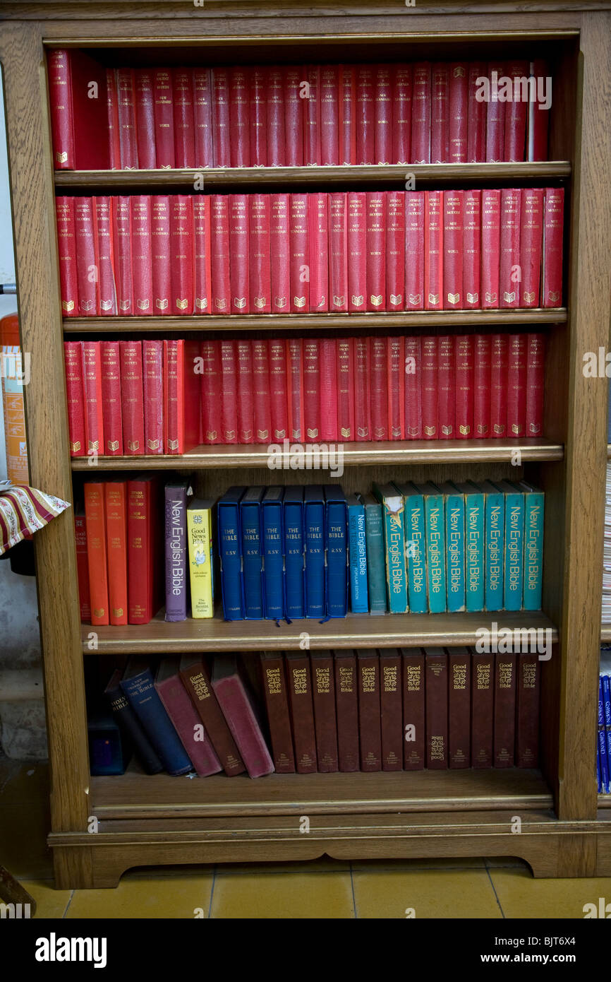 Bookcase of hymn song books and bibles inside a christian church Stock ...
