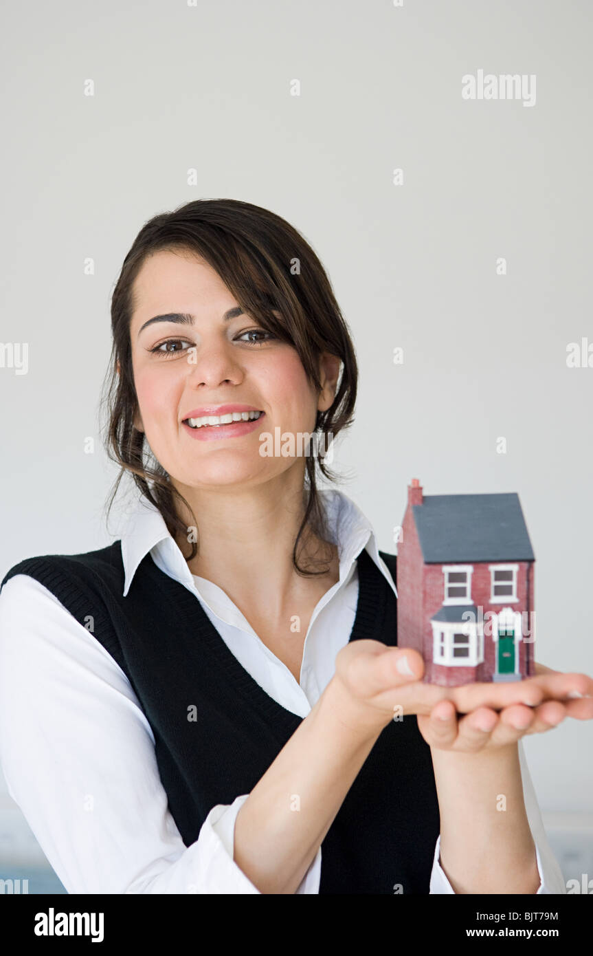 Woman looking model house made hi-res stock photography and images - Alamy