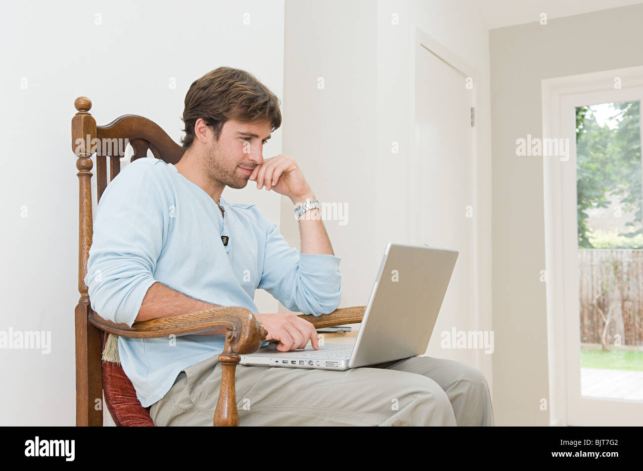 Man with laptop Stock Photo - Alamy