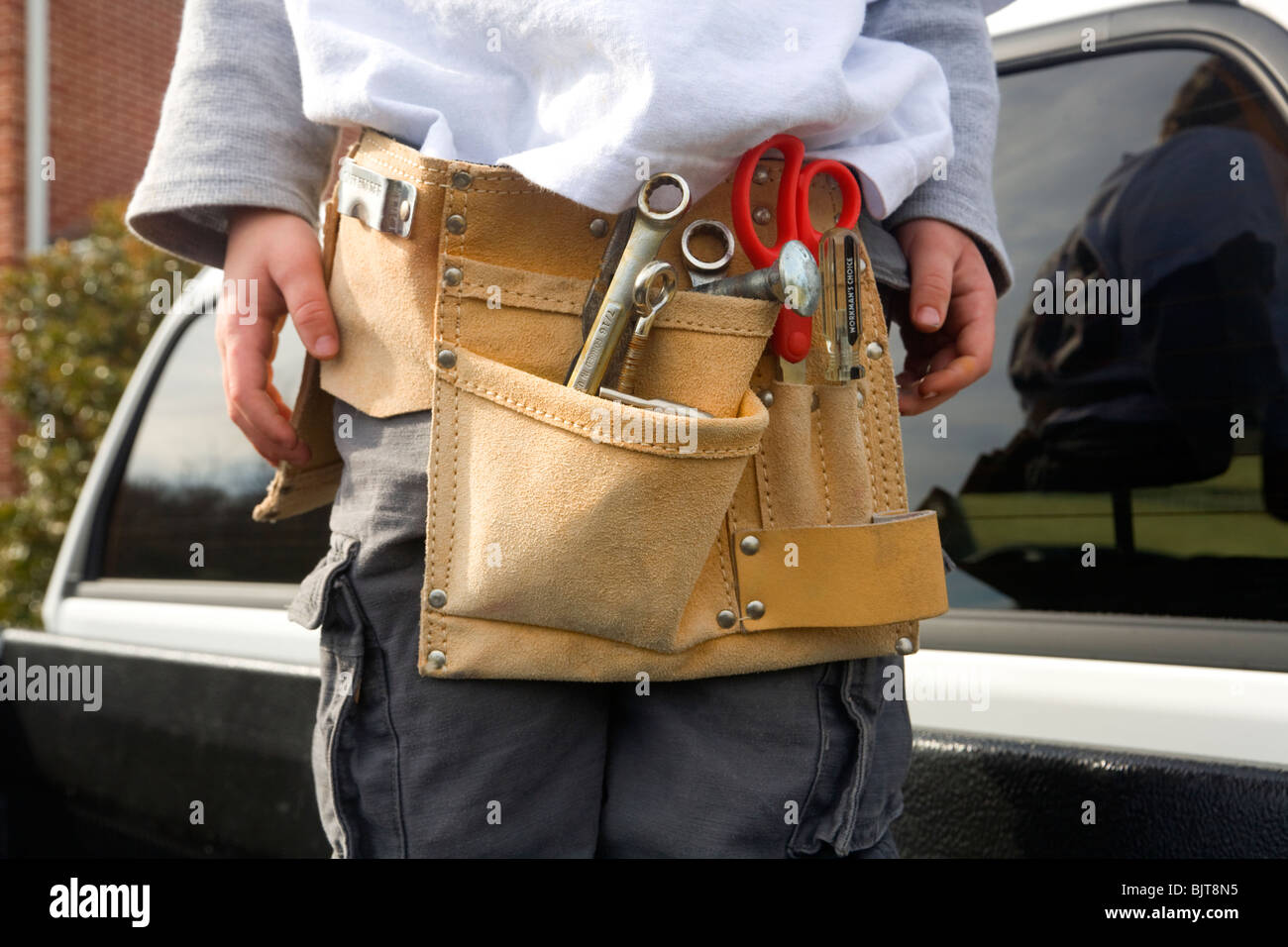 Little boy with tools Stock Photo - Alamy