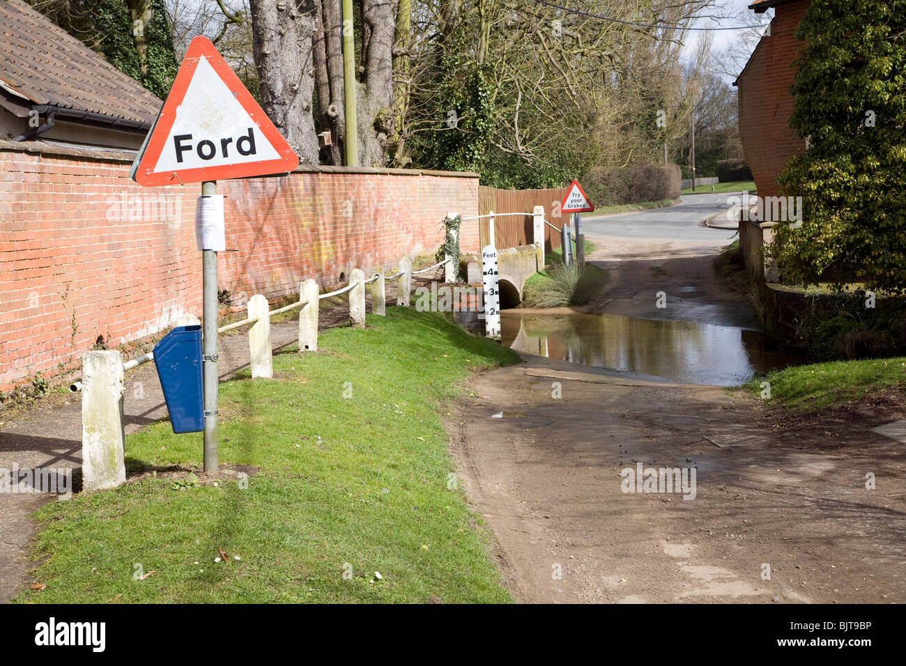 Road passing through ford on River Lark, Grundisburgh, Suffolk Stock ...