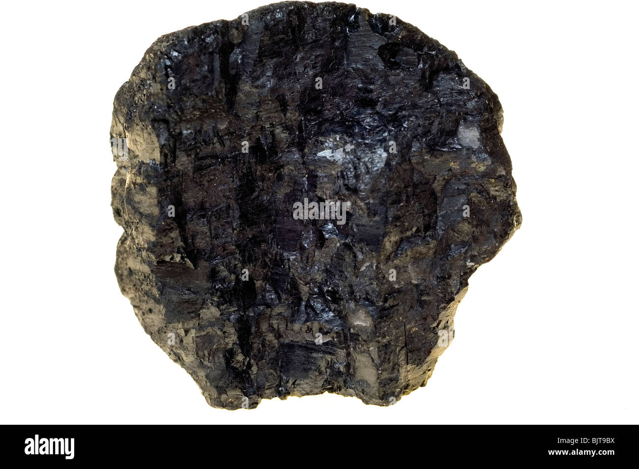 Piece of coal close-up isolated on white background Stock Photo - Alamy
