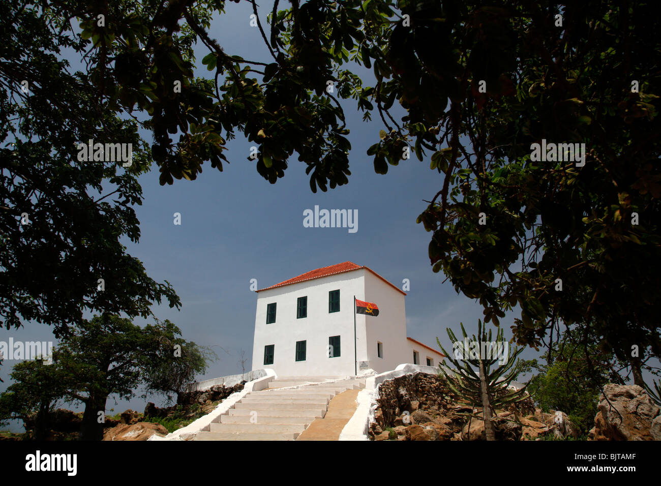 The white painted chapel of the Slave museum stands opposite the island ...