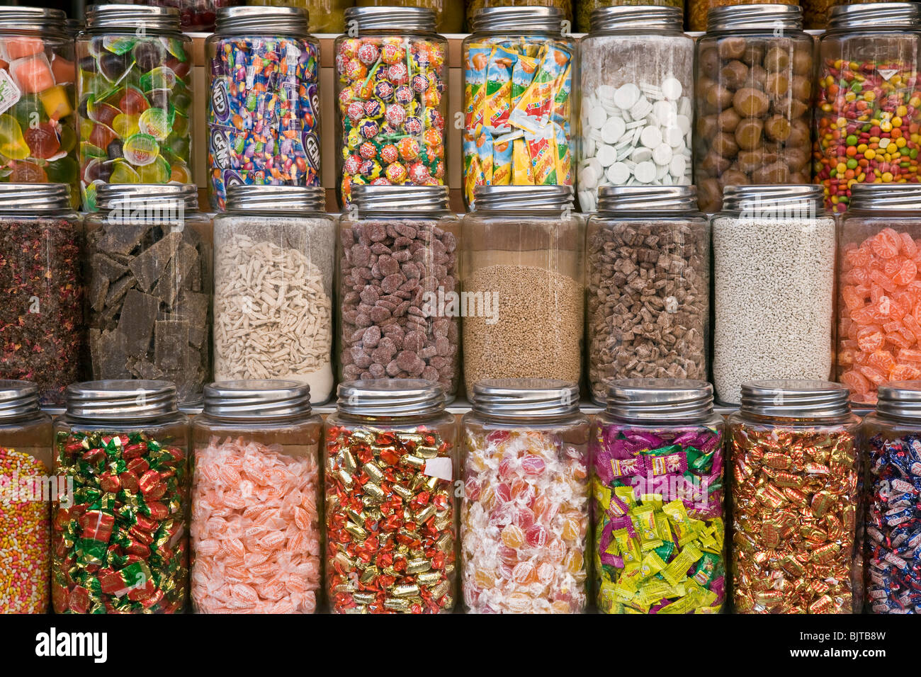 Sweets in crystal jugs. Bikaner street shop. Rajasthan. India Stock ...
