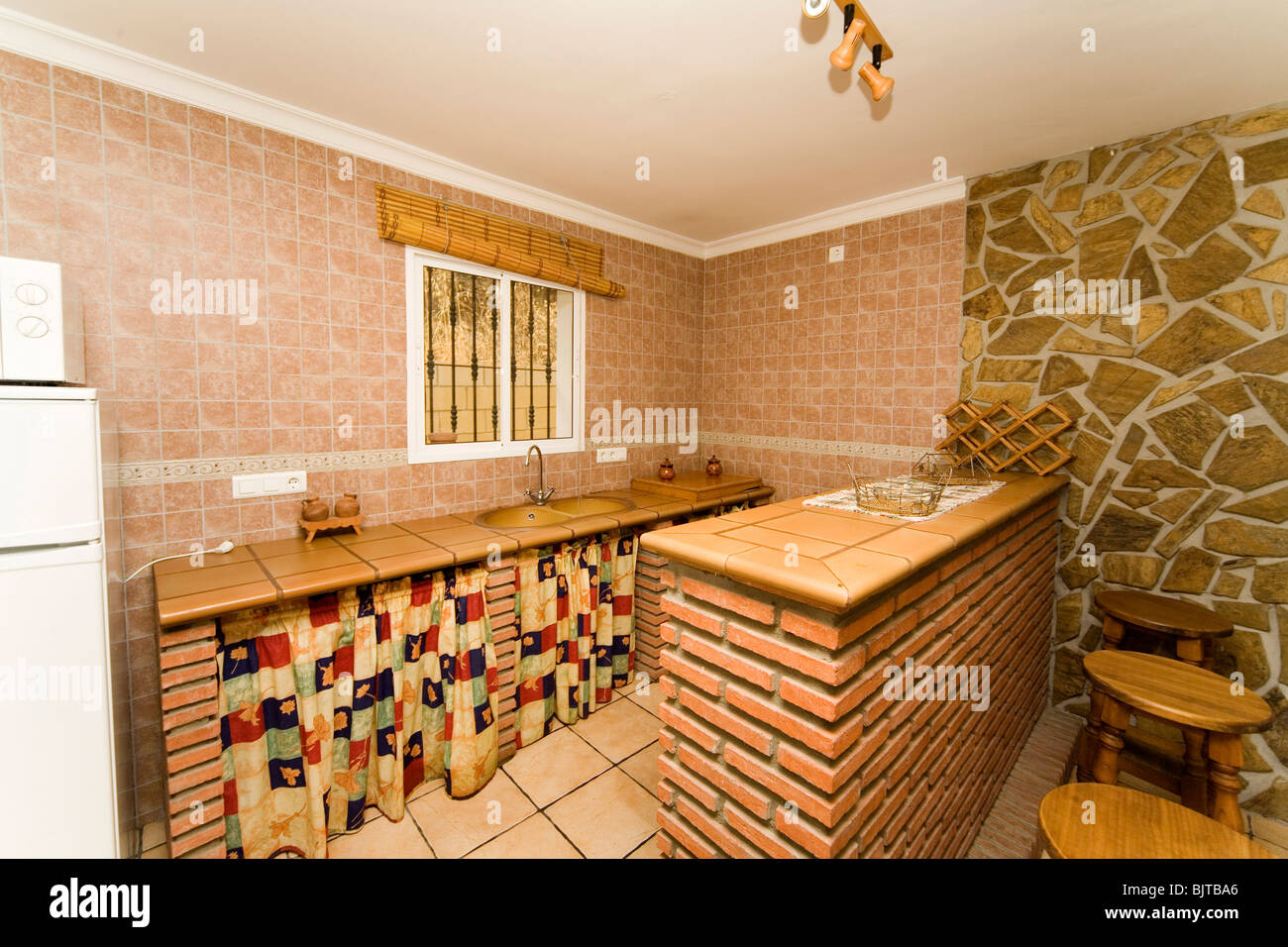 Small domestic kitchen in a Turkish villa Stock Photo - Alamy