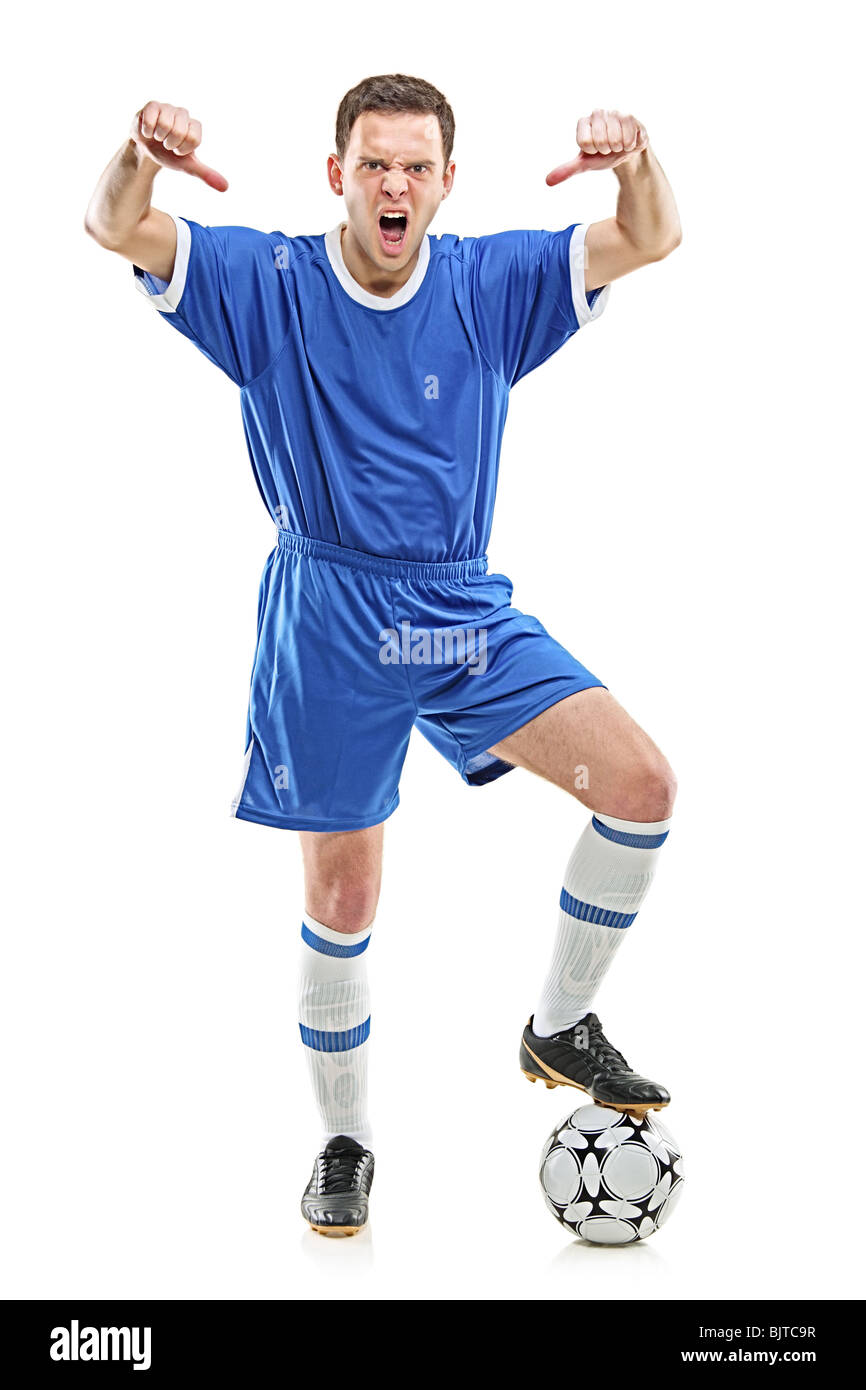 An angry soccer player shouting and giving thumbs down Stock Photo - Alamy