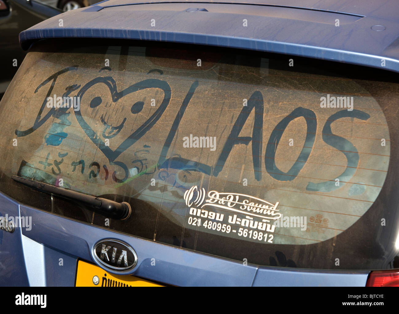 Car with 'I Love Laos' written in window dust Vientiane Laos Stock ...
