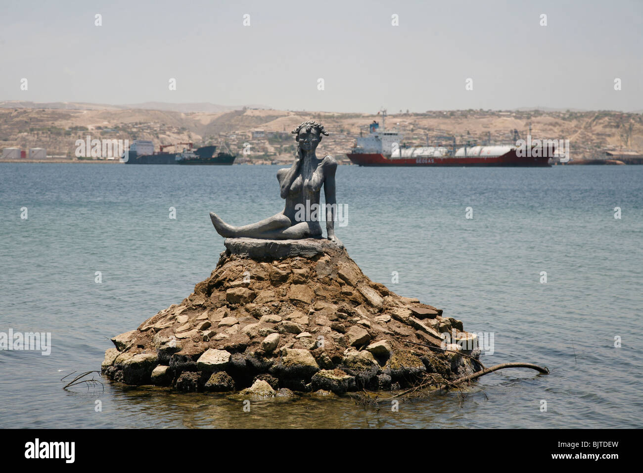Mermaid sculpture in the bay of the Restinga sand spit. In the ...