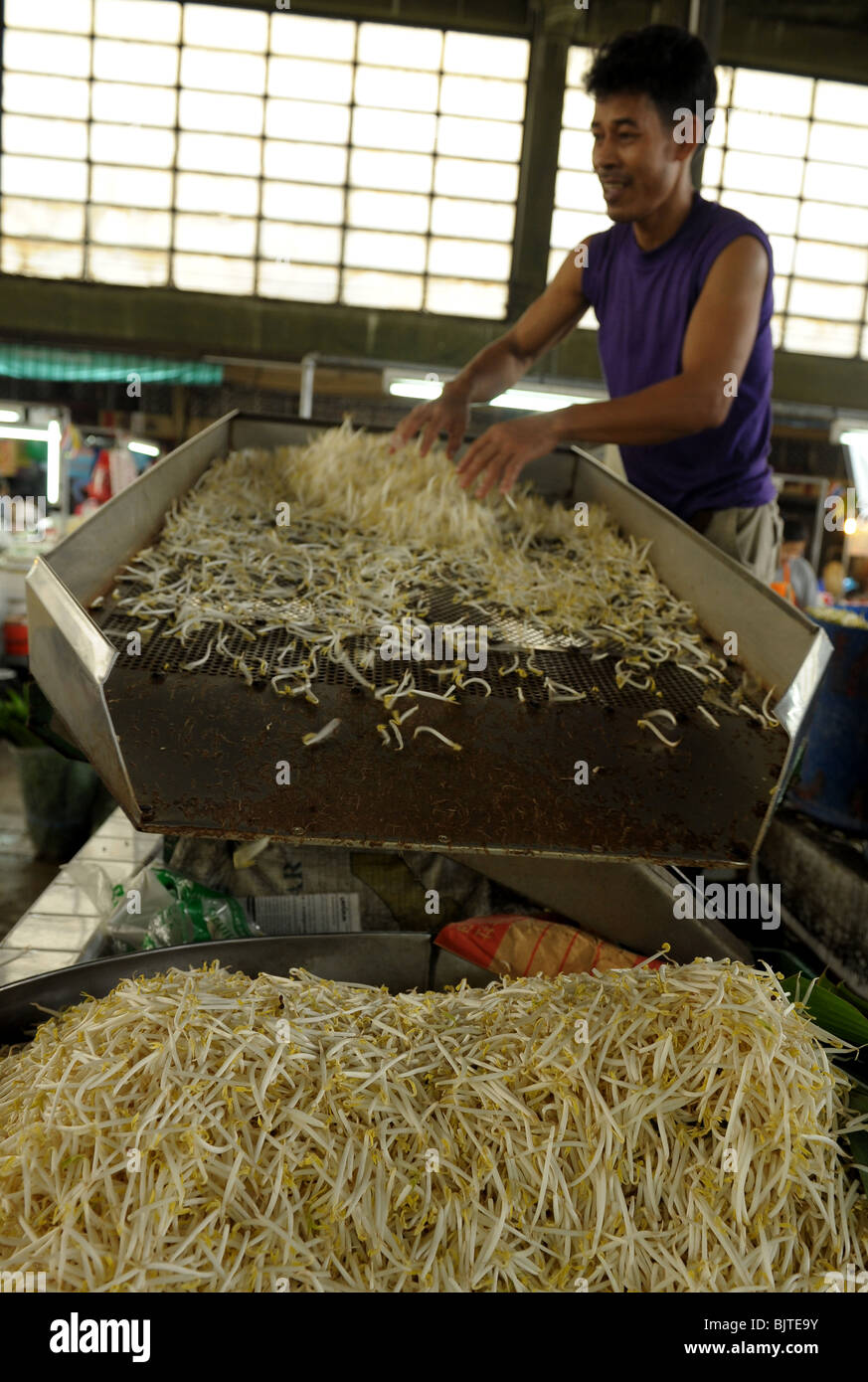 bean sprouts being sorted by machine and hand ,Wongwian Yai Market and ...