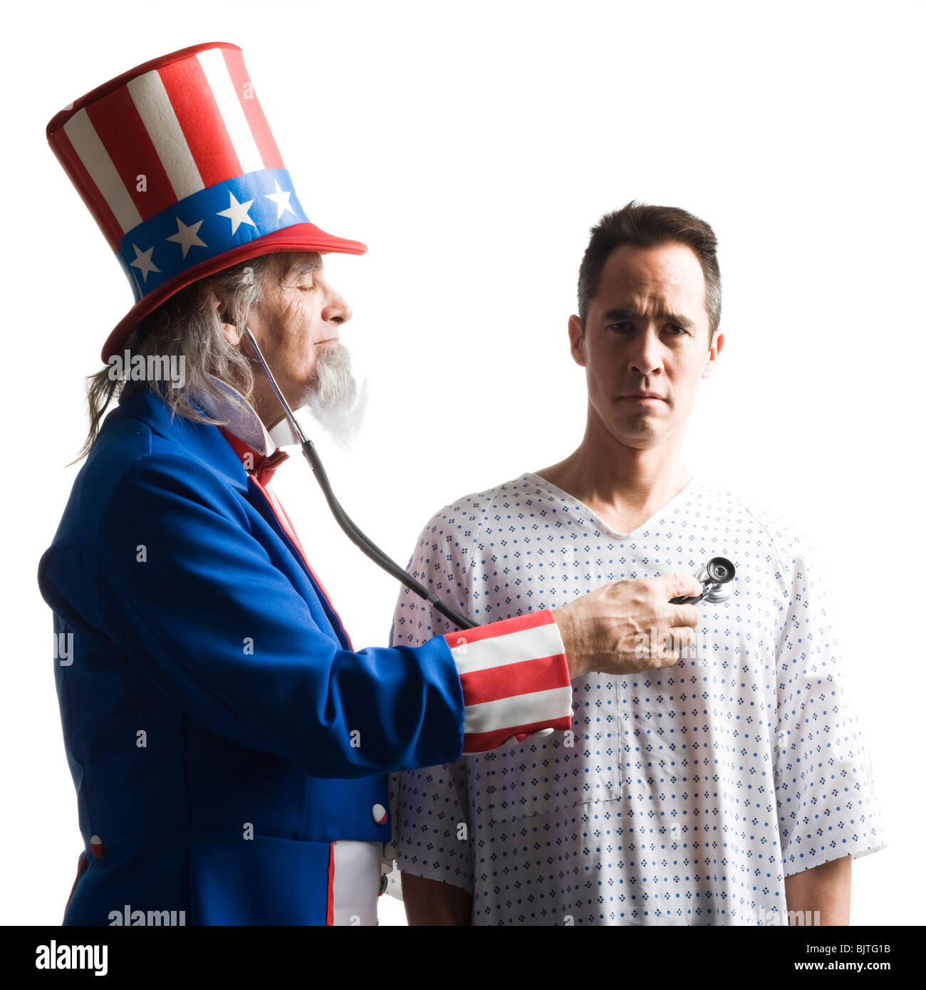 Man in Uncle Sam's costume as a doctor examining patient, studio shot ...