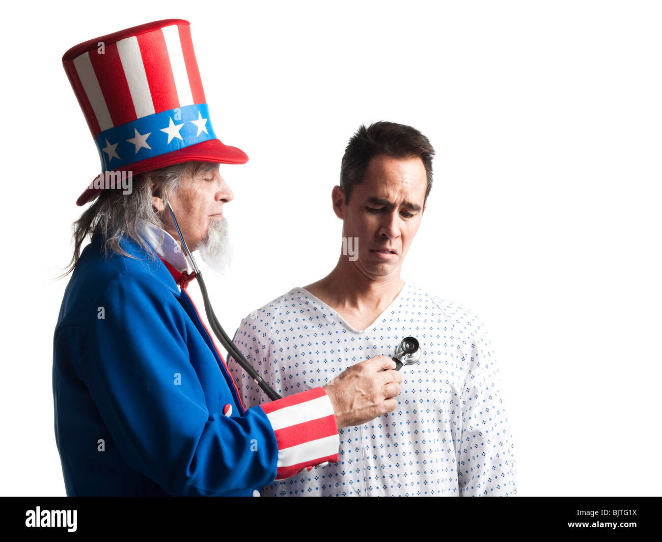 Man in Uncle Sam's costume as a doctor examining patient, studio shot ...