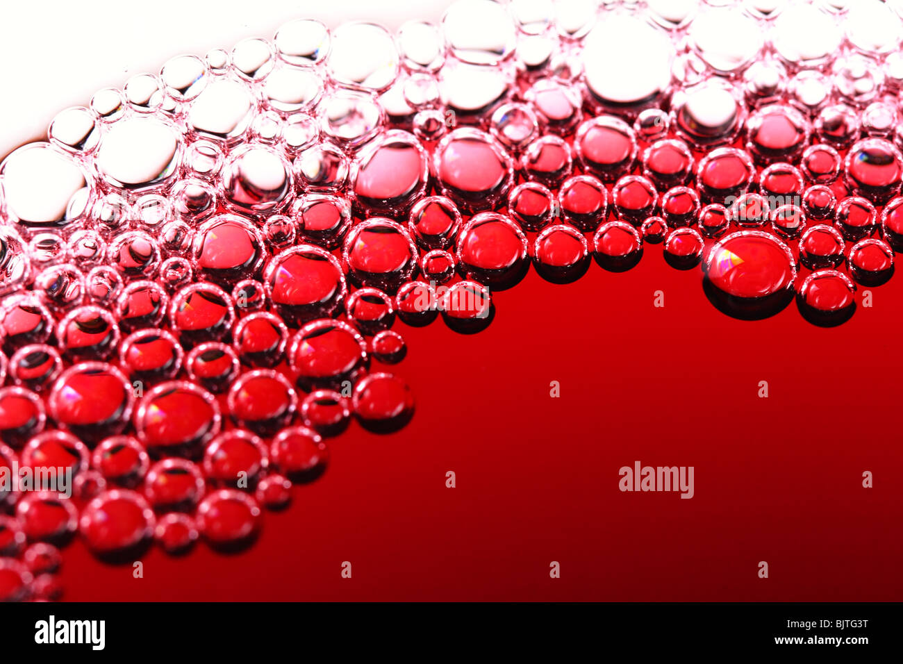 abstract red wine bubbles, close up shot Stock Photo - Alamy