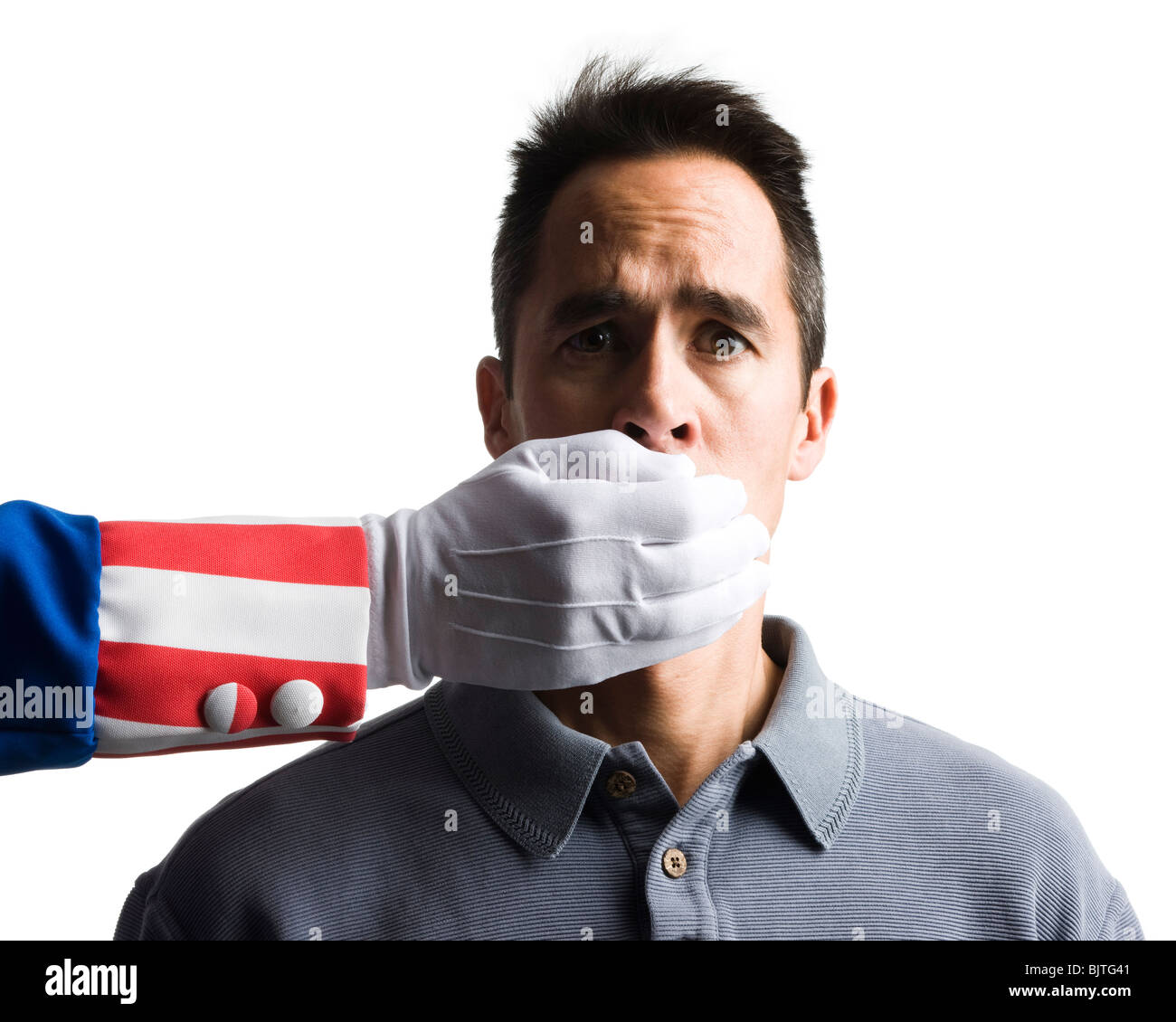 Human hand in Uncle Sam's costume shielding man's mouth, studio shot ...