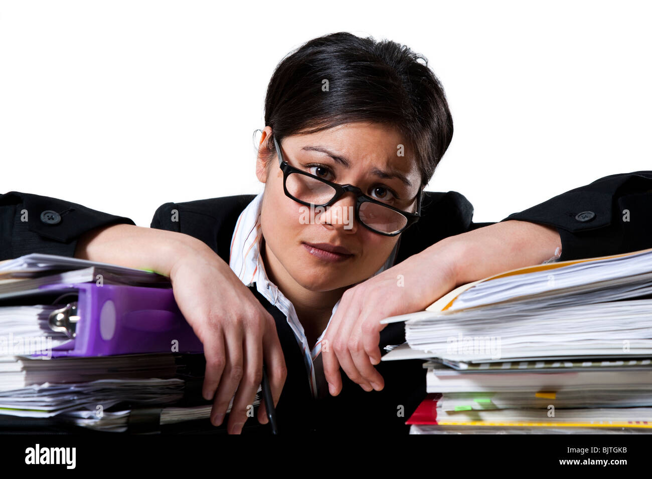 Woman with stack of binders Stock Photo - Alamy