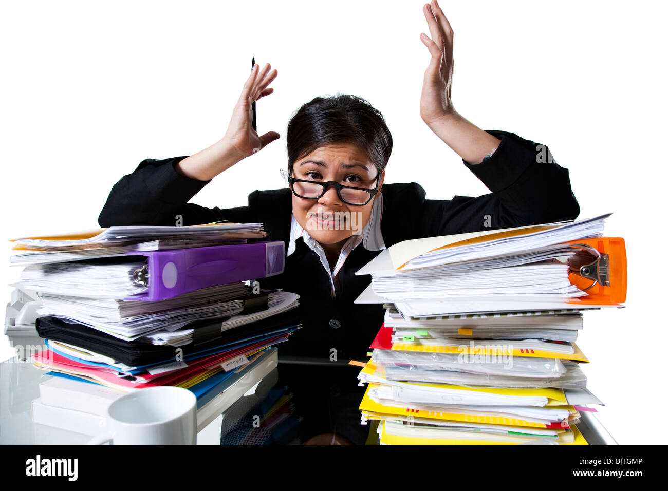 Woman with stack of binders and paperwork Stock Photo - Alamy
