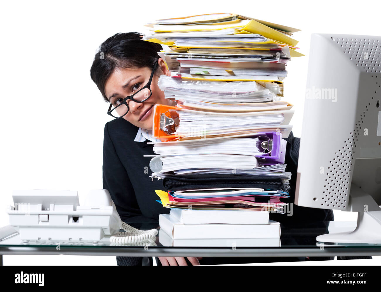 Woman with stack of binders and paperwork Stock Photo - Alamy