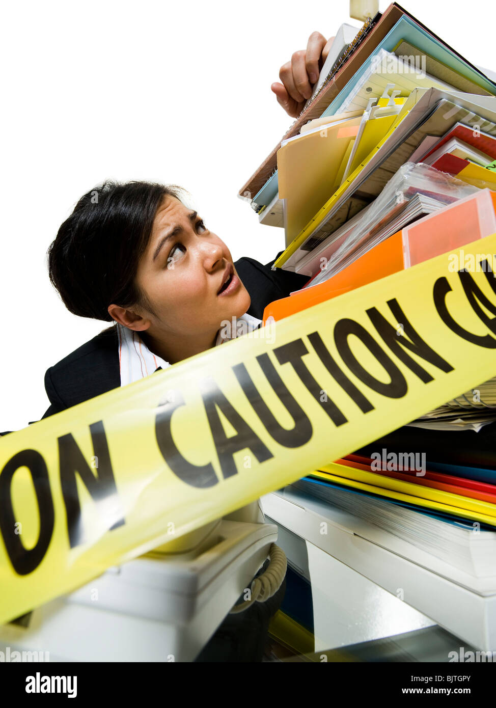 Woman with stack of binders and paperwork Stock Photo - Alamy