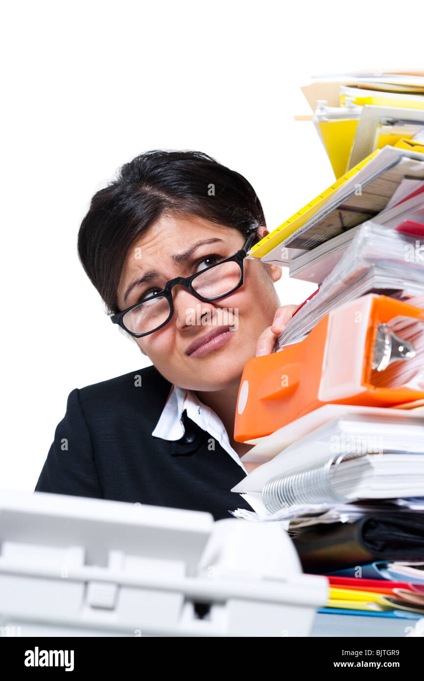 Woman with stack of binders and paperwork Stock Photo - Alamy
