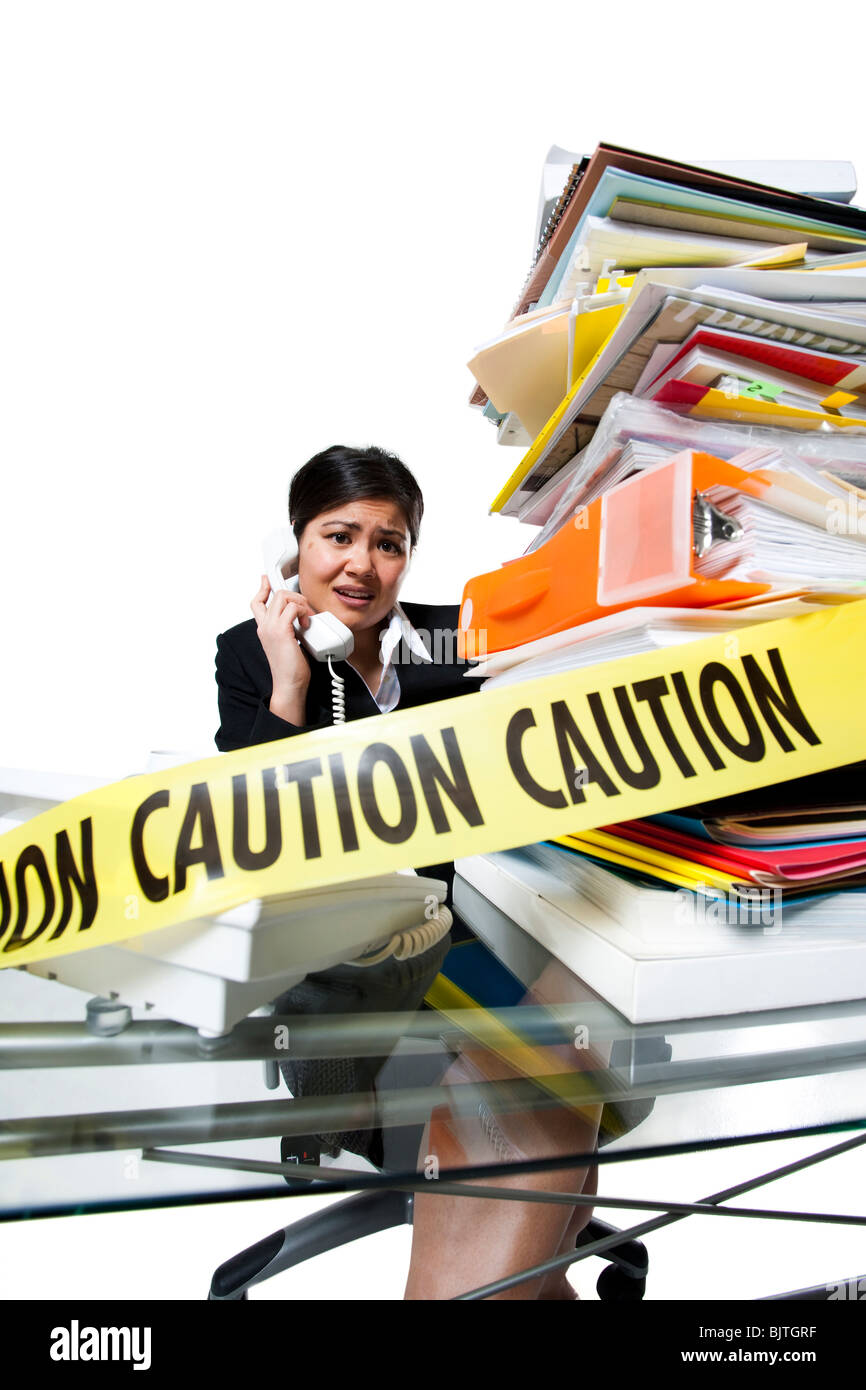 Woman with stack of binders and paperwork Stock Photo - Alamy