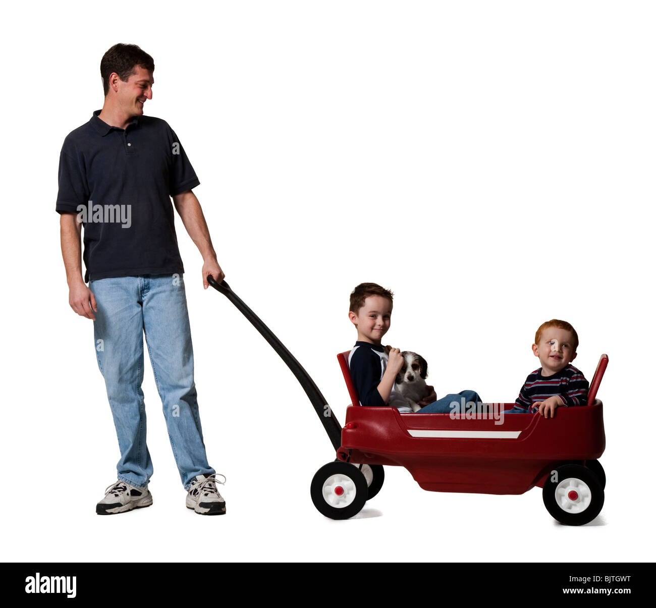 Father with sons and toy wagon Stock Photo - Alamy