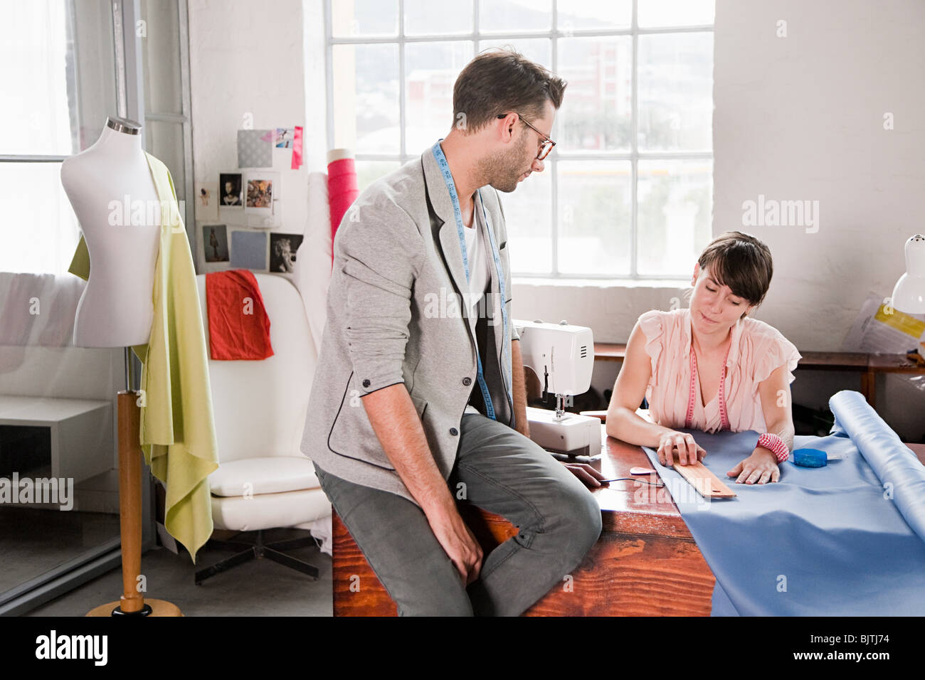 Fashion designers at work Stock Photo - Alamy