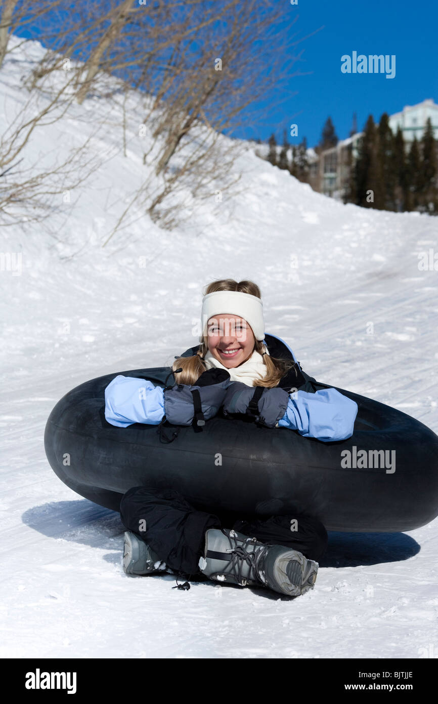 Girl with inner tube Stock Photo - Alamy