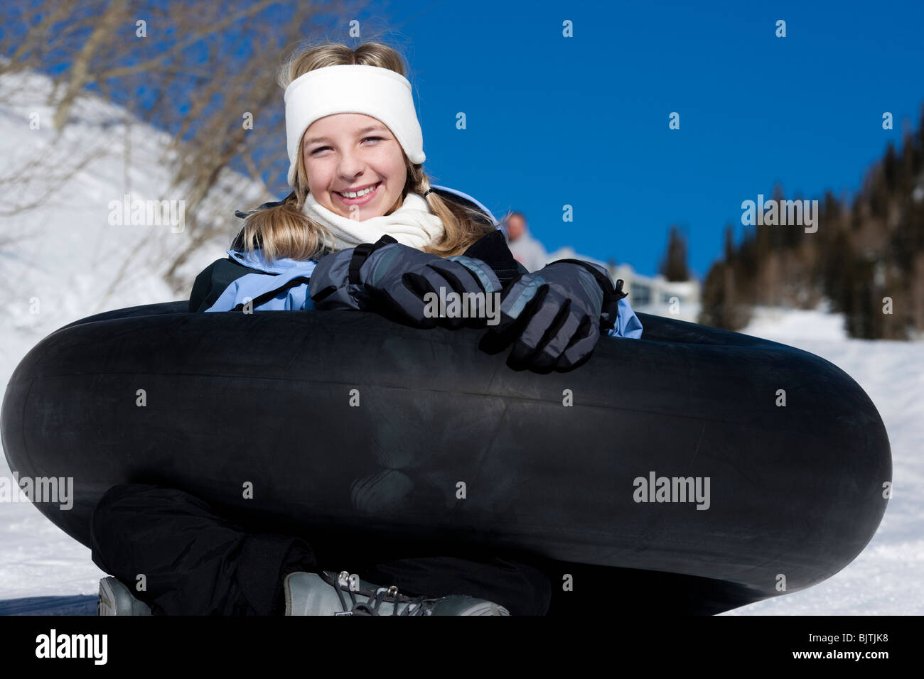 Girl with inner tube Stock Photo - Alamy