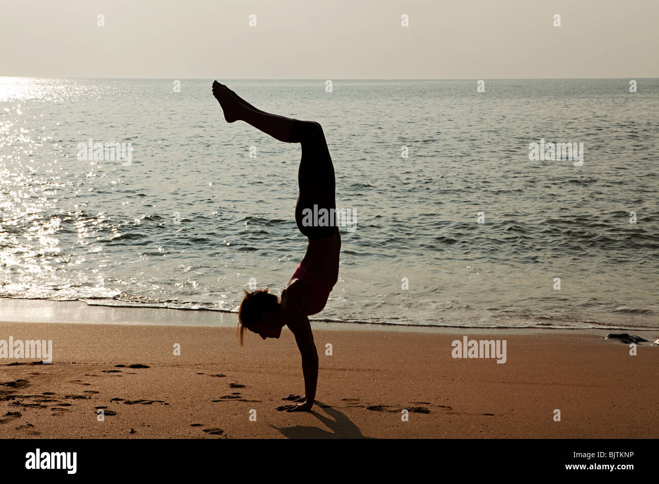 Female woman beach yoga india hi-res stock photography and images - Alamy