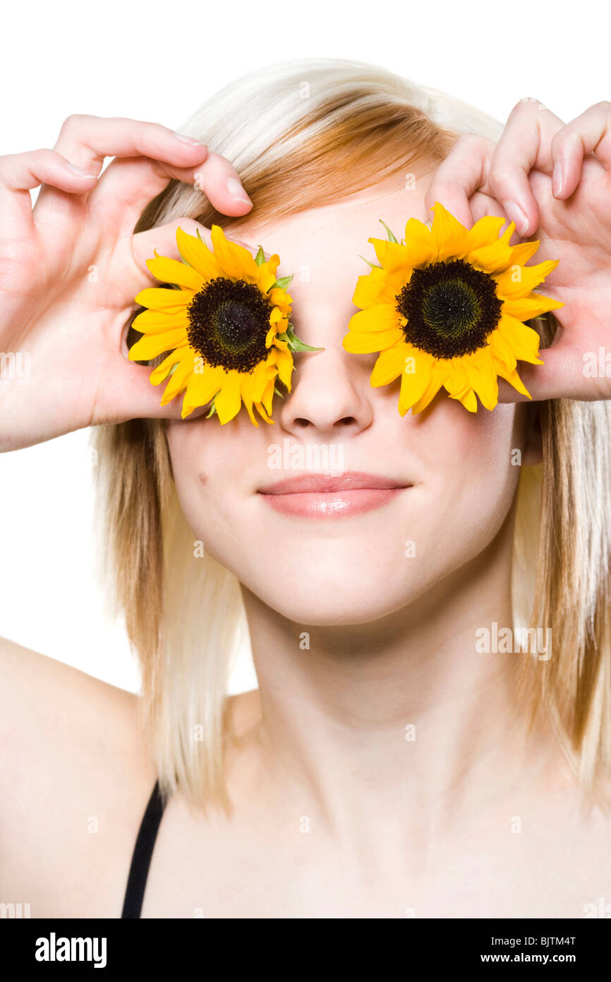 Woman with sunflower eyes Stock Photo - Alamy