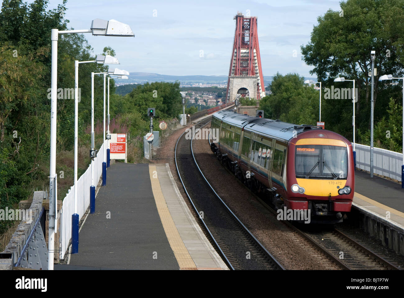 DMU train approaching Dalmeny Station from the Forth Bridge, South ...