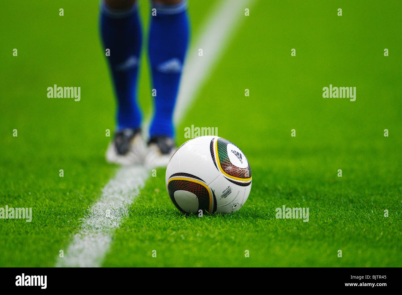footballers legs and Jabulani, official matchball of the FIFA world Cup ...