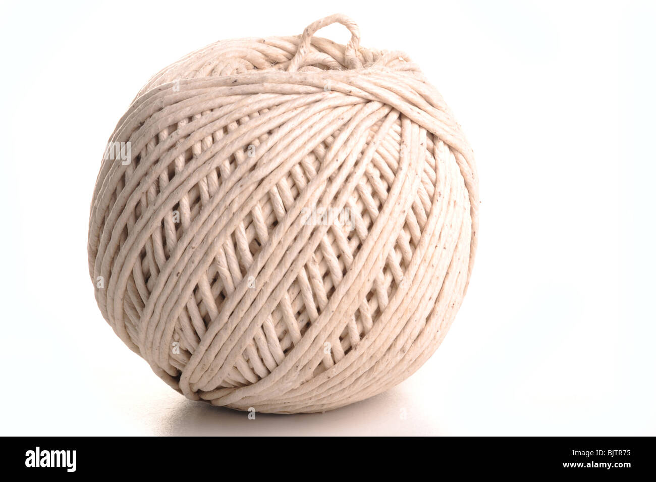 Ball of string photographed in studio against a white background Stock ...