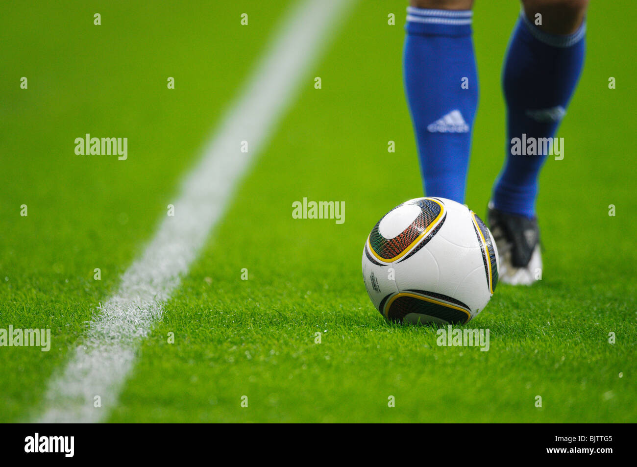 footballers legs and Jabulani, official matchball of the FIFA world Cup ...