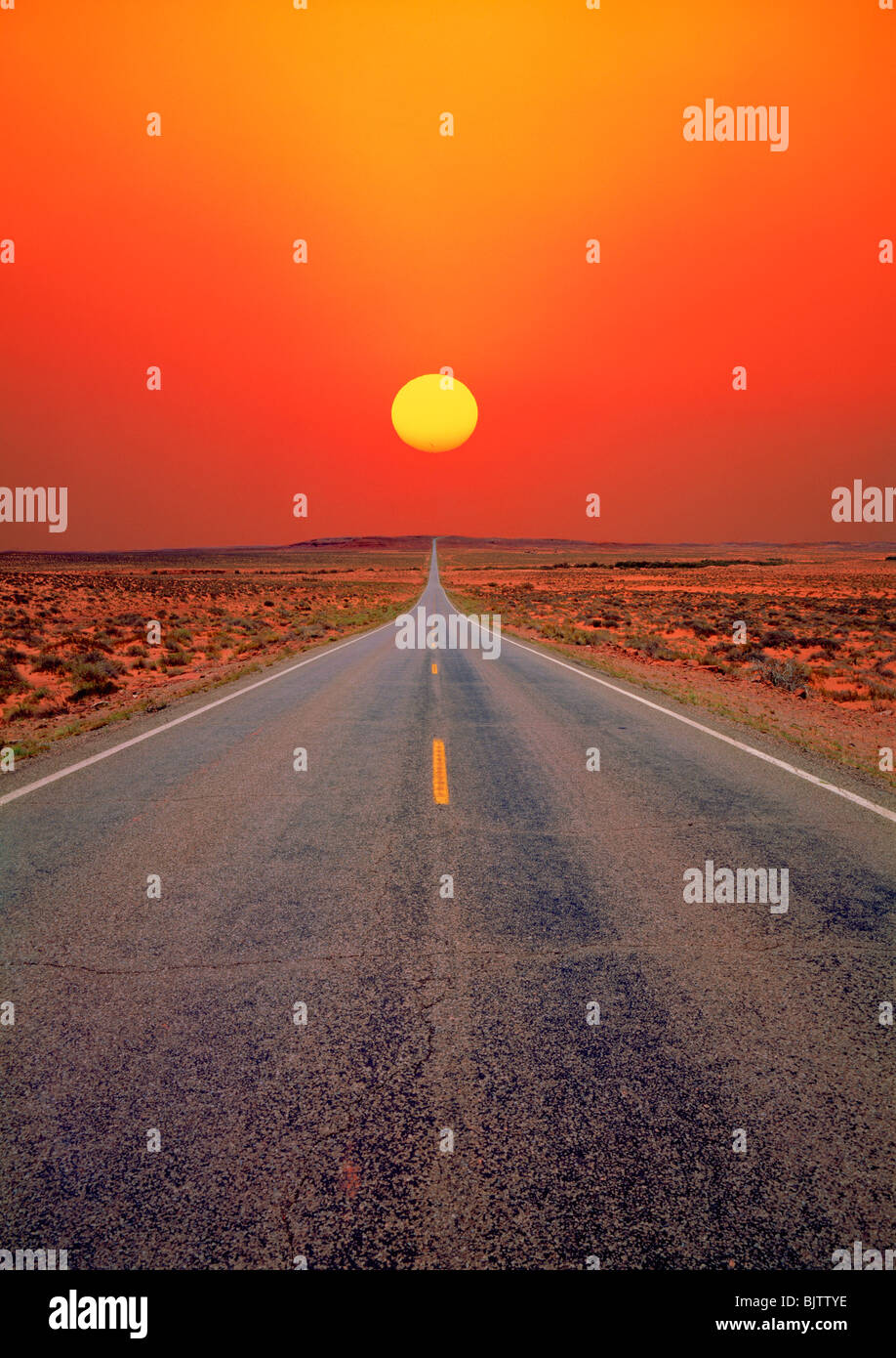 Straight road through landscape Stock Photo - Alamy