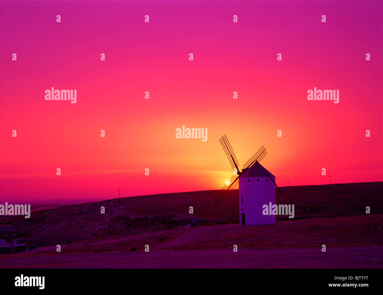 Majestic sunset behind windmill Stock Photo - Alamy