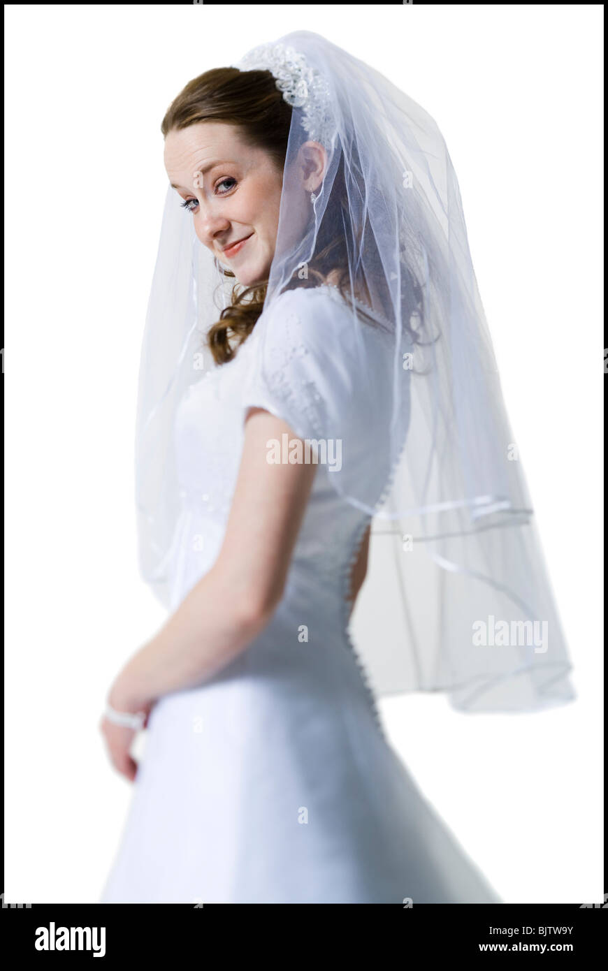 Bride standing and posing Stock Photo - Alamy