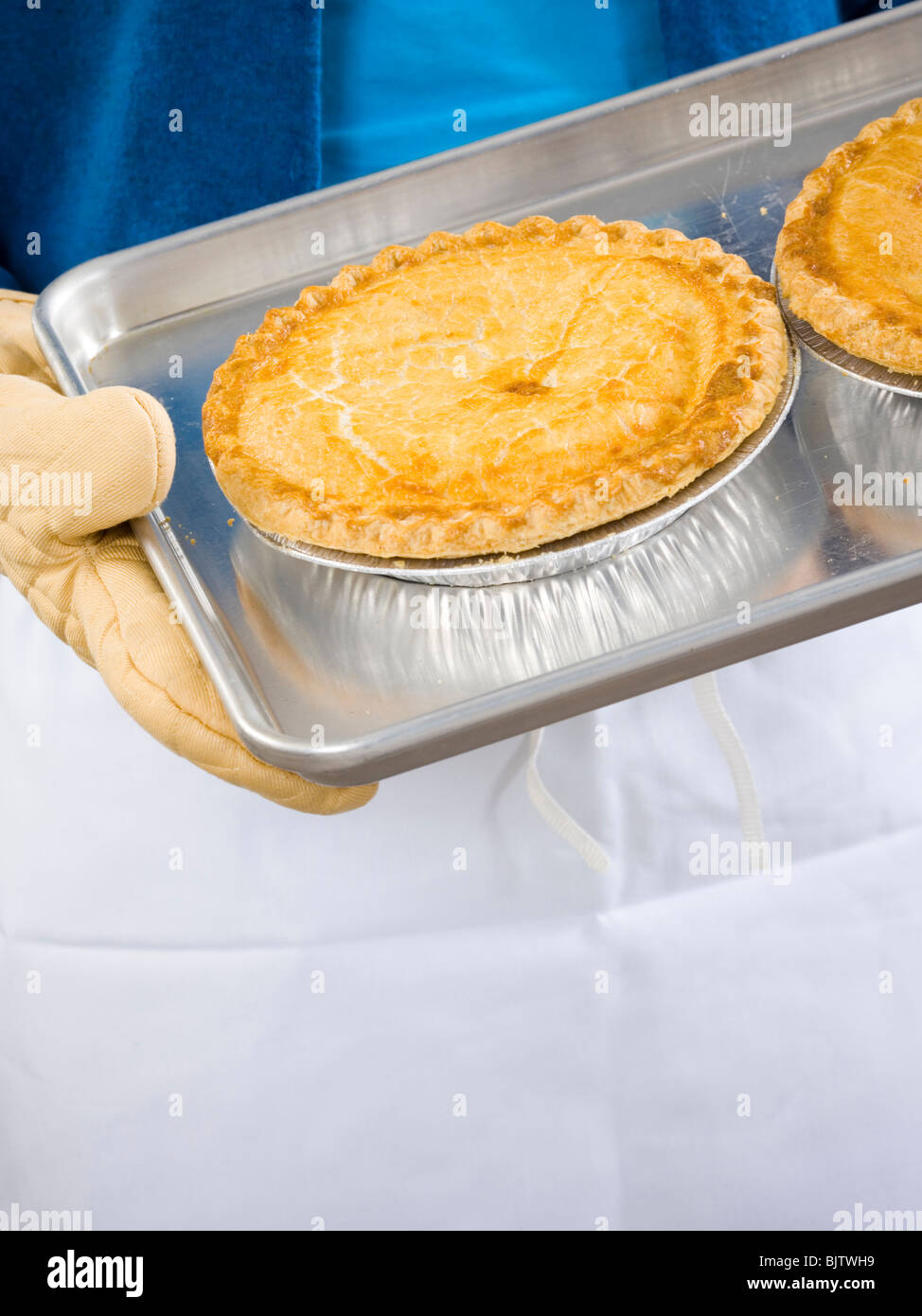 Woman with two pies Stock Photo - Alamy