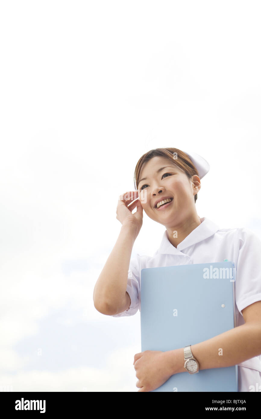 Nurse holding file folder hi-res stock photography and images - Alamy