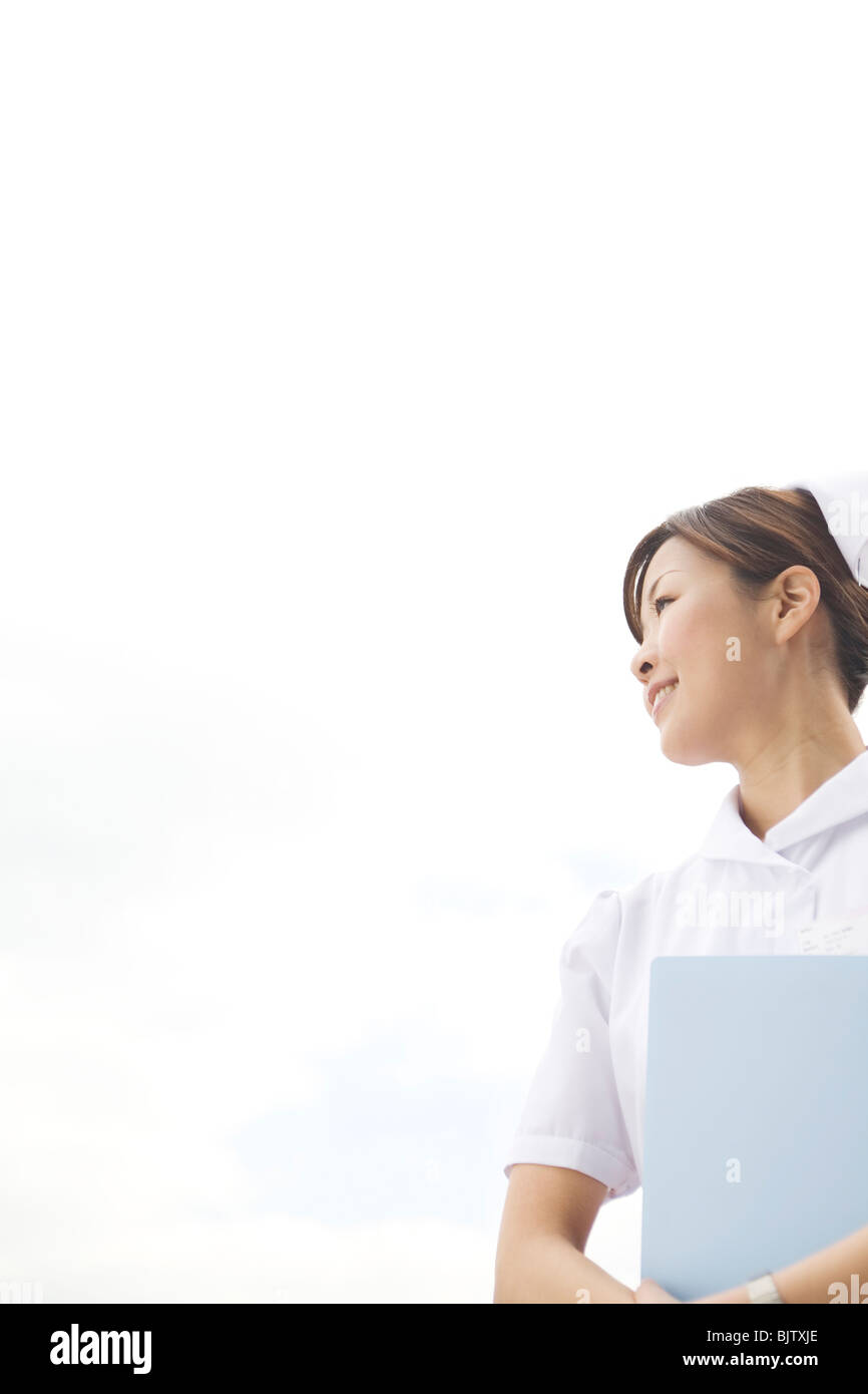 Nurse holding file folder hi-res stock photography and images - Alamy