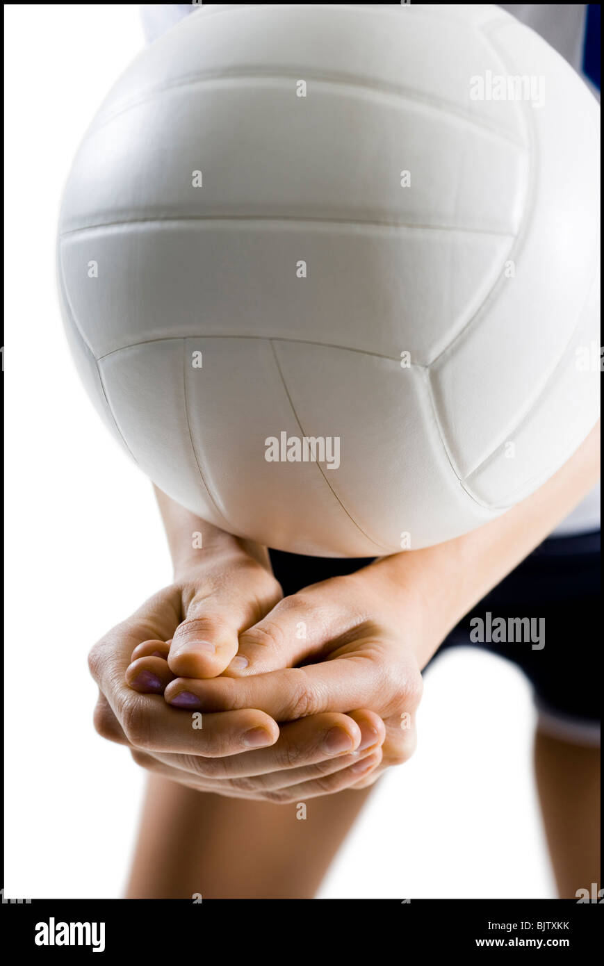 Young woman serving volleyball hi-res stock photography and images - Alamy