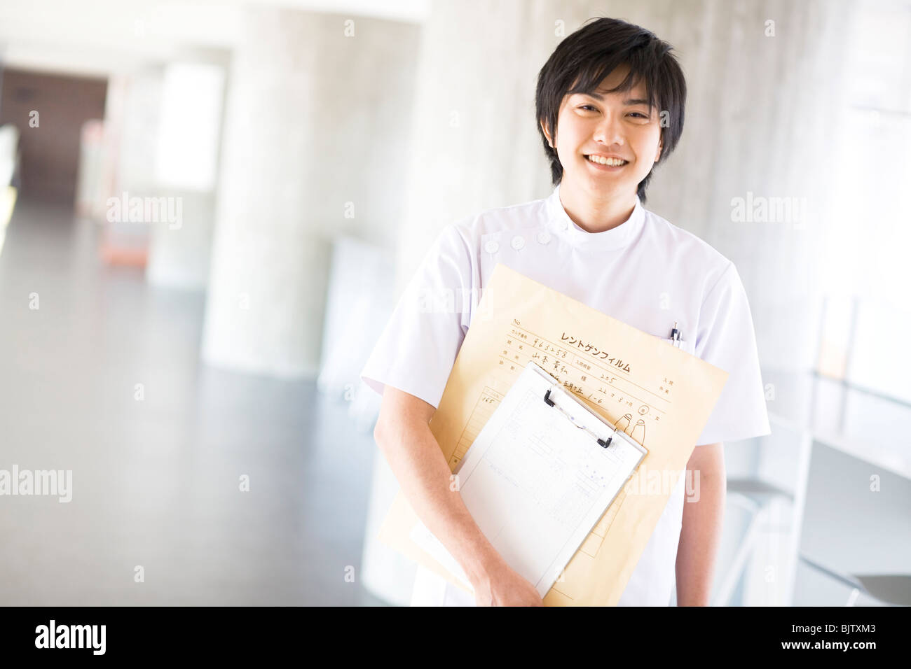 X-ray technician smiling at the camera Stock Photo - Alamy