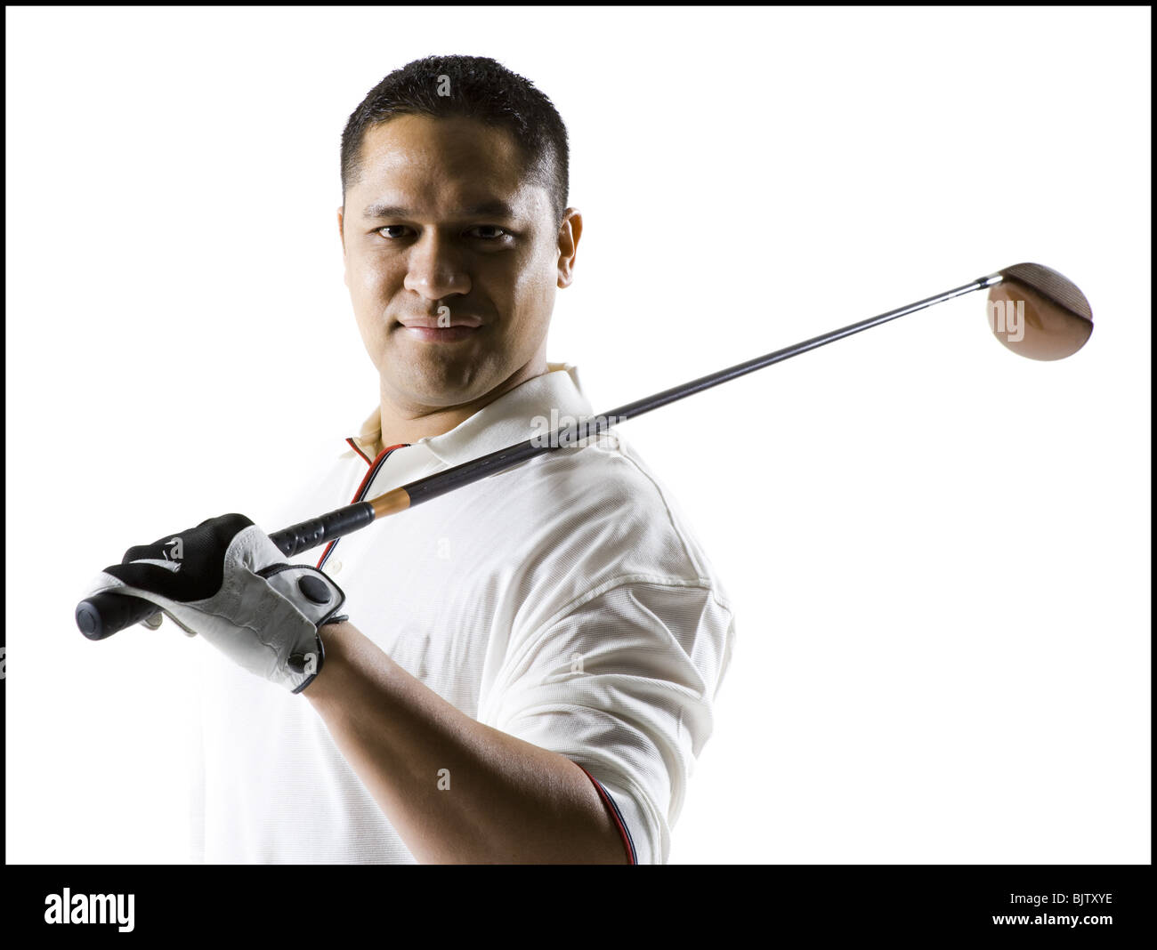 Golfer with club Stock Photo - Alamy