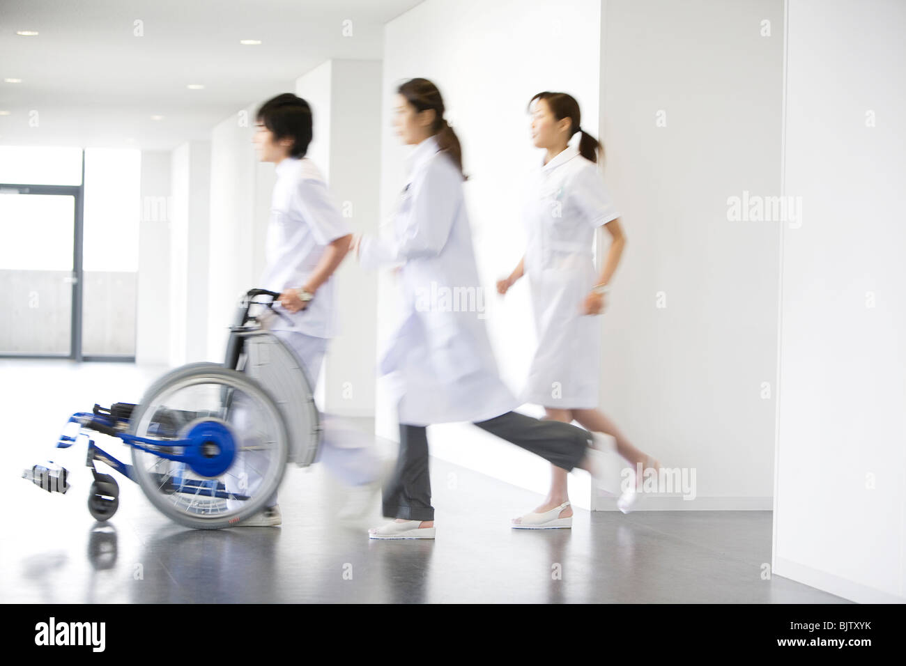 Wheelchair hospital running hi-res stock photography and images - Alamy