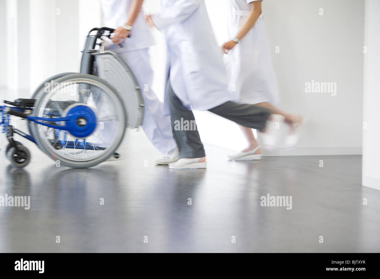 Wheelchair hospital running hi-res stock photography and images - Alamy