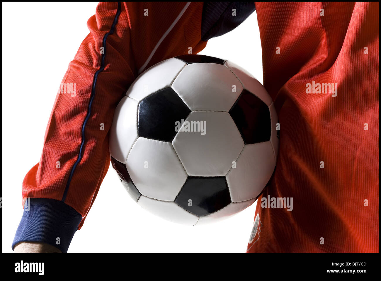 Soccer player with ball Stock Photo - Alamy