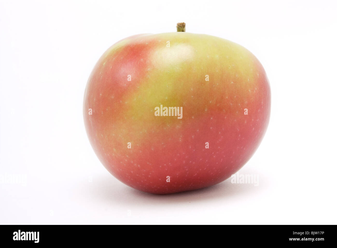 Red macintosh apple from low viewpoint isolated against white ...
