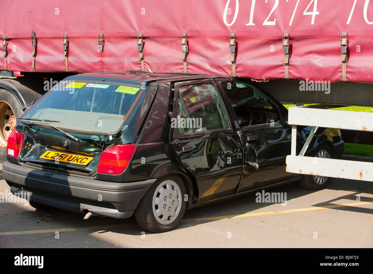 Car crashed under trailer of HGV Lorry Stock Photo - Alamy