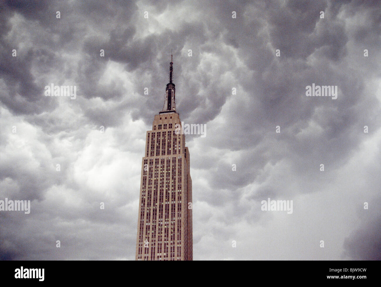 "Empire State Building in Storm Clouds Stock Photo - Alamy