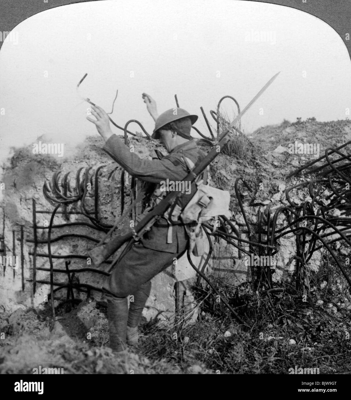 A soldier triggers a booby trap, World War I, 1914-1918.Artist ...