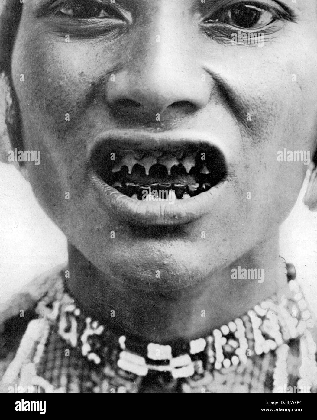 Filed teeth hi-res stock photography and images - Alamy